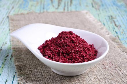 Sumac is a spice made from the dried berry of a wild bush called Rhus